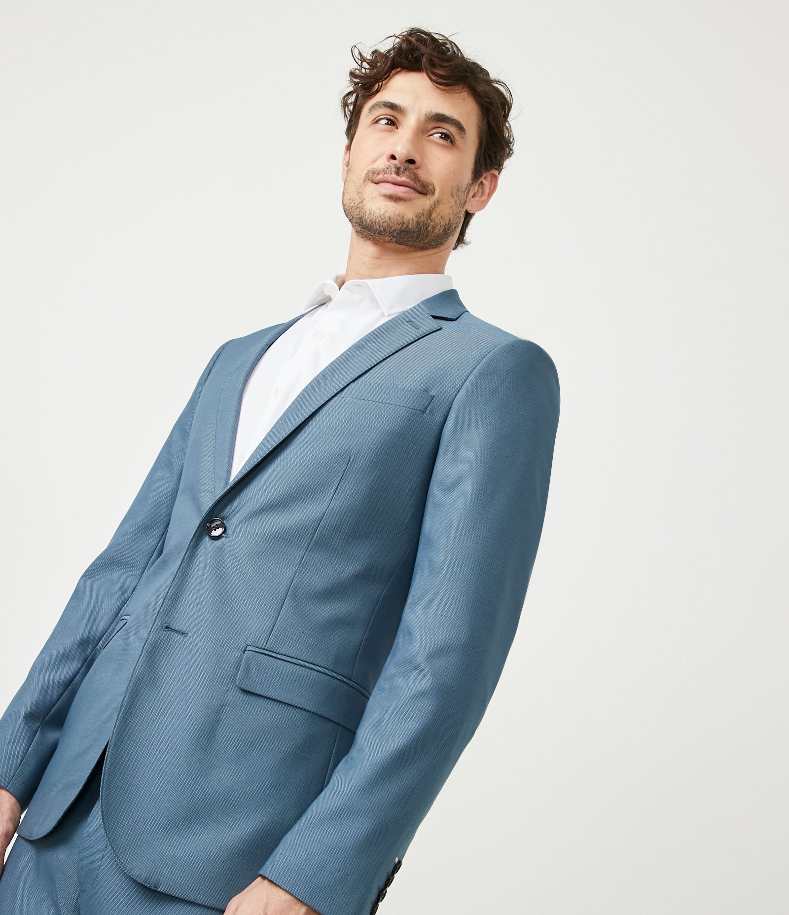 Paletó Super Slim com Textura Maquinetada e Bolsos Azul Médio