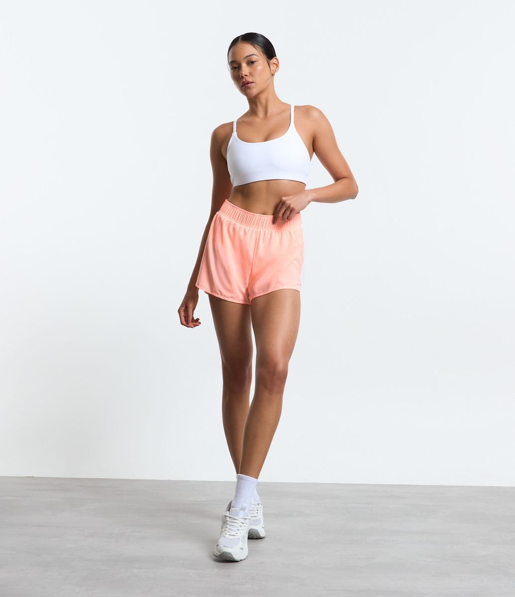 Short Runner Esportivo com Elástico no Cós e Bolso Interno Laranja Claro