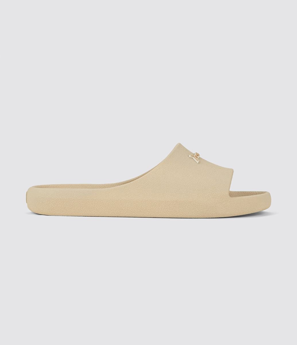 Chinelo Slide Drip Texturizado e com Etiqueta Rider Bege - Renner