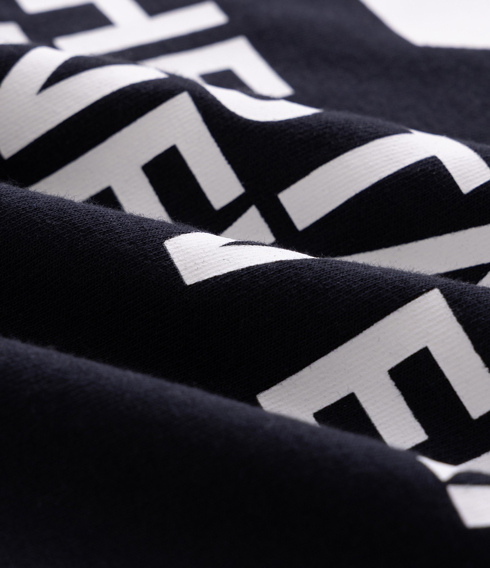 Camiseta Oversized em Algodão com Estampa Estrelas e Lettering Preto